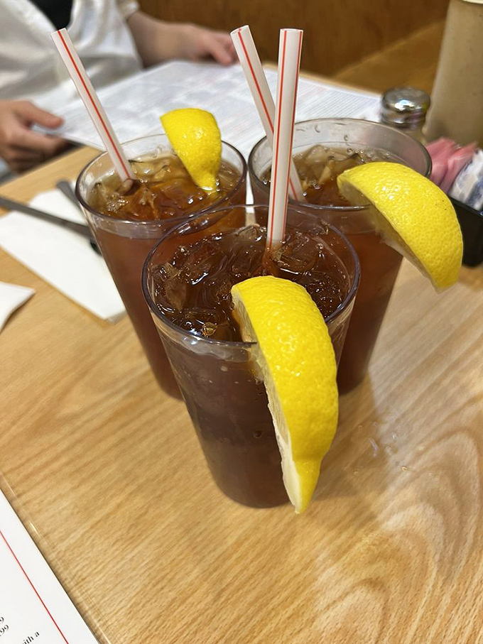 Tall glasses of iced tea with generous lemon wedges &ndash; the perfect companion to cut through the richness of a serious deli sandwich.