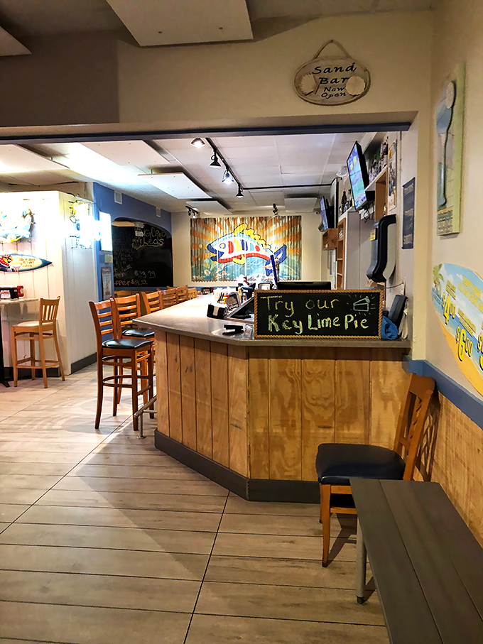 The "Sand Bar" offers a casual spot to enjoy a drink while contemplating life's important questions&mdash;like which seafood dish to order next. 