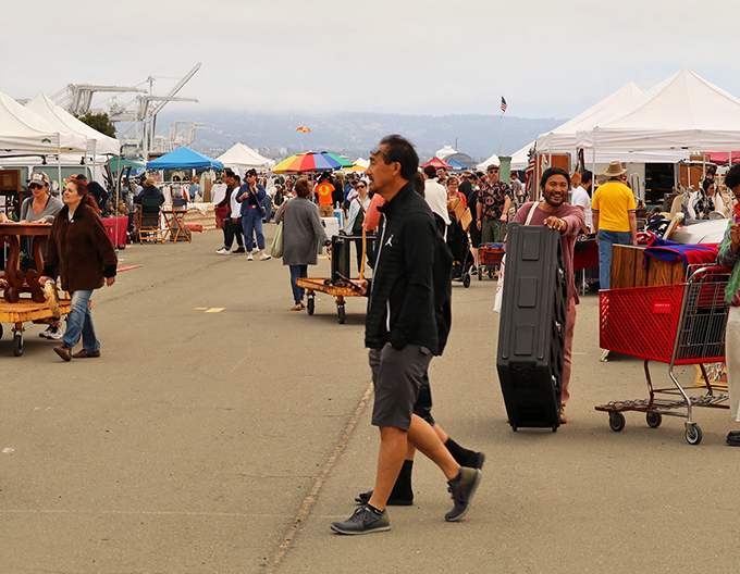 The thrill of the hunt in action. Shoppers navigate narrow pathways between booths, eyes peeled for that perfect find.