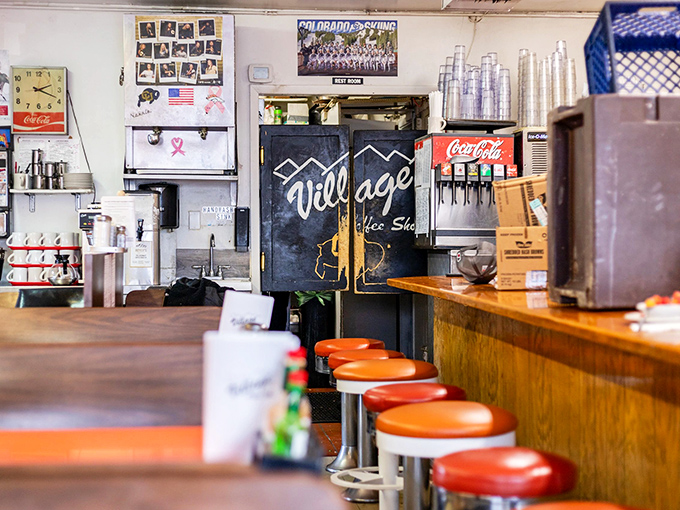 The counter seats offer front-row tickets to the breakfast show, where spatulas fly and coffee flows like conversation.