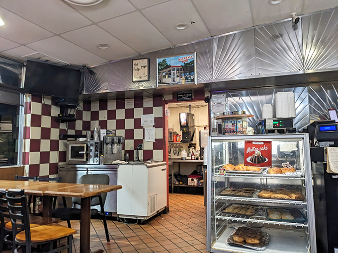 The checkered walls aren't trying to be retro-cool; they've earned their vintage status the hard way&mdash;by actually being vintage.