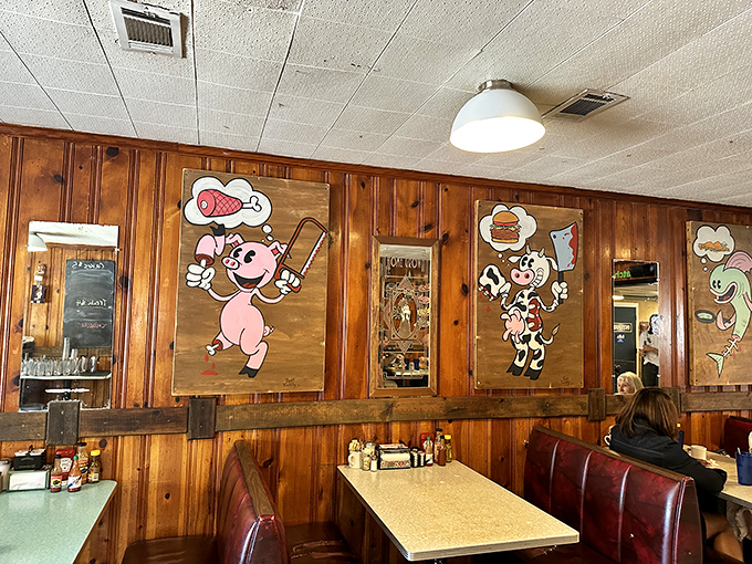 Whimsical artwork featuring dreaming farm animals adorns the wood-paneled walls. They're thinking about food&mdash;just like everyone else in the room.