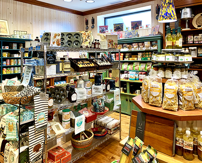A candy wonderland where wooden shelves, warm lighting, and tin ceilings create the perfect backdrop for sweet-tooth satisfaction.