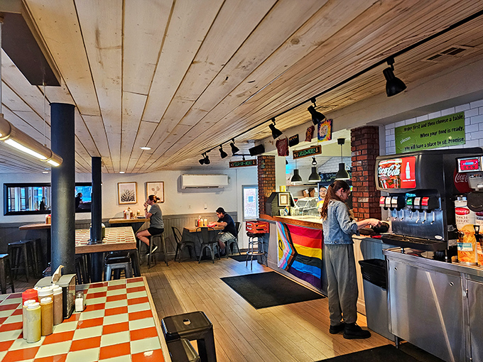 Wooden ceiling planks and checkerboard floors create a space where taco dreams come true and diet plans go to die.