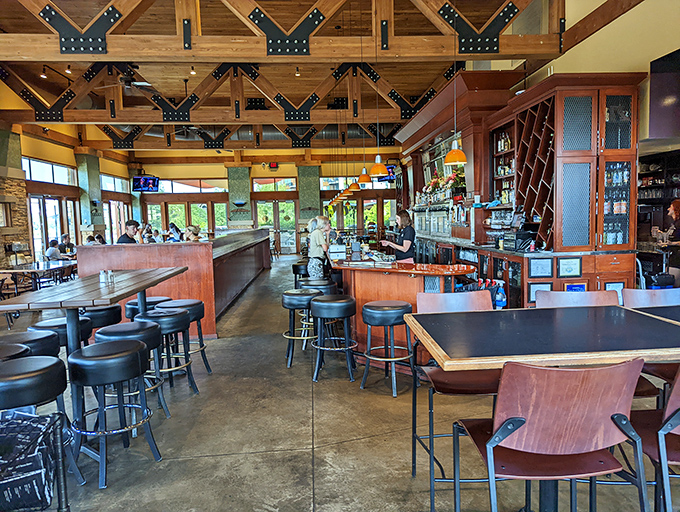 Exposed wooden beams and thoughtful design create a space that feels both grand and intimate&mdash;like dining in a modern mountain lodge designed by someone with excellent taste.