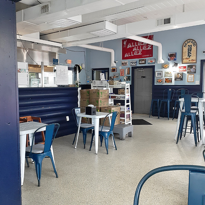 Blue chairs, blue walls, and soccer memorabilia - it's like dining in a corner of Britain that somehow drifted across the Atlantic.