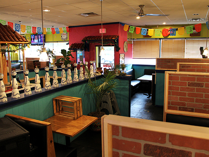 Colorful papel picado banners and Chivas memorabilia create an atmosphere that's part sports bar, part abuela's dining room.