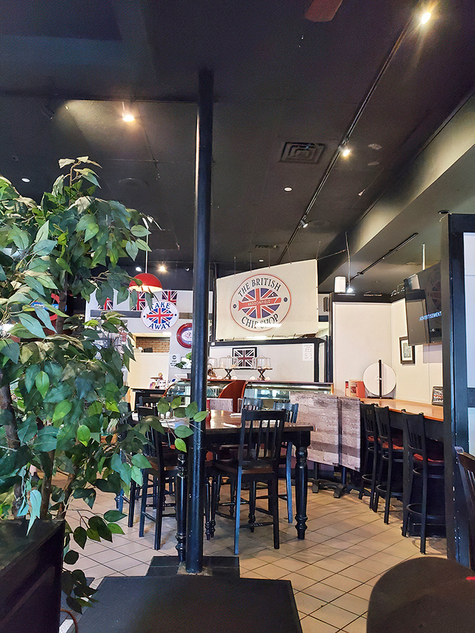 Union Jacks hang proudly while indoor greenery adds warmth. The perfect balance of British pride and cozy neighborhood charm.