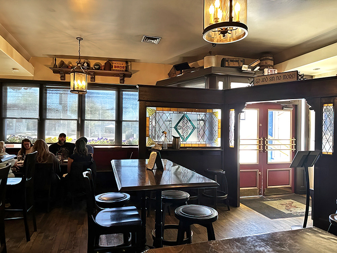 Stained glass accents and wooden booths create cozy nooks where you can hide from the desert sun and pretend you're in Dublin.
