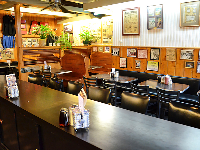 Counter seating where strangers become friends over coffee refills. The wall of memories reminds you that you're just the latest character in this diner's ongoing story.