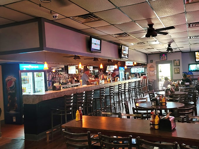 Where magic happens. The bar area at Dinker's offers front-row seats to the social symphony of an authentic Nebraska institution.