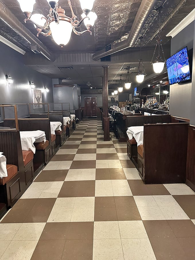 Classic checkered floors lead you past white-clothed tables toward culinary bliss. Old-school steakhouse vibes with none of the pretension.