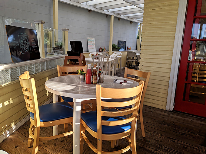 The kind of cozy dining room where strangers become friends over shared syrup dispensers. 