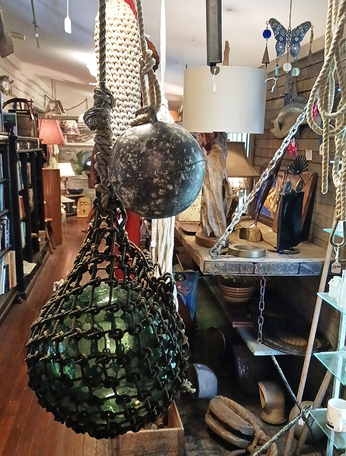 That's not just any fishing float &ndash; it's a genuine glass buoy suspended in rope netting, the kind that once guided sailors and now guides interior designers.