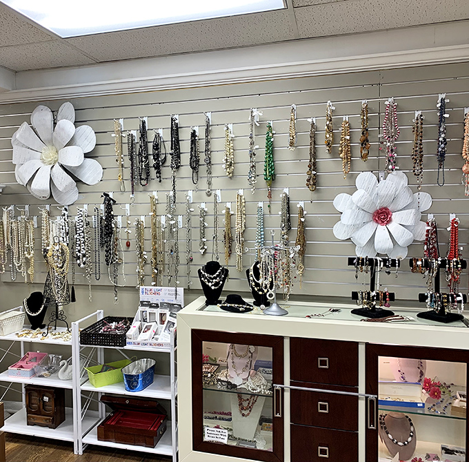 Jewelry displayed with boutique flair—because someone's discarded accessories are another's statement pieces waiting for their moment to shine.