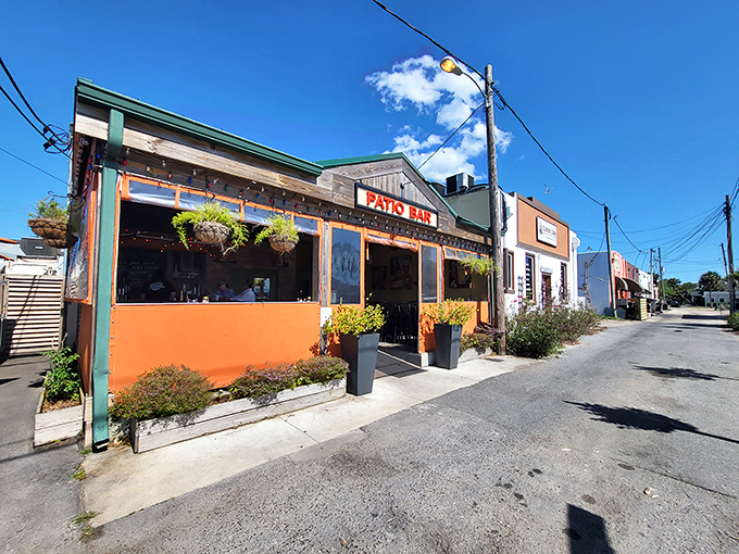 Joe Mama's Wood Fired Kitchen brings serious pizza credentials to this small coastal town. That bright orange exterior promises flavor inside.