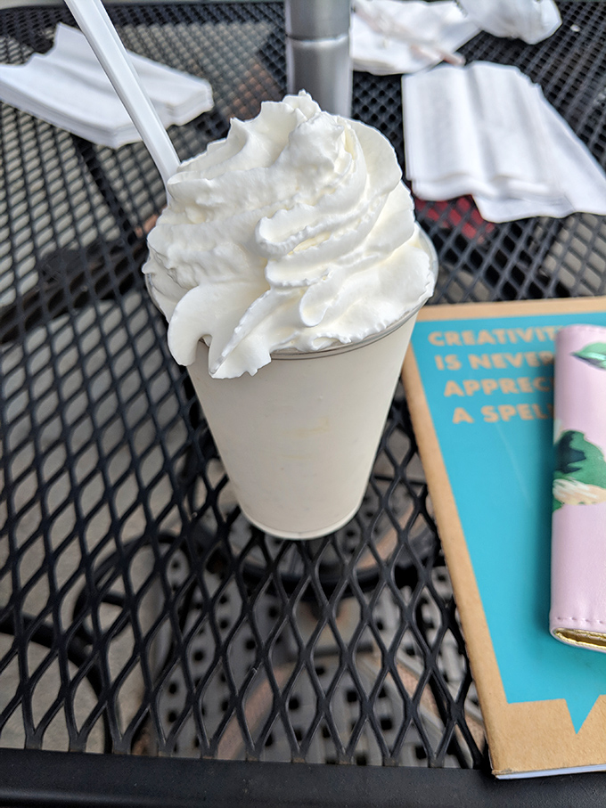 The vanilla custard mountain with its perfect swirl is what ice cream dreams of becoming when it grows up. Patio dining makes it taste even better.