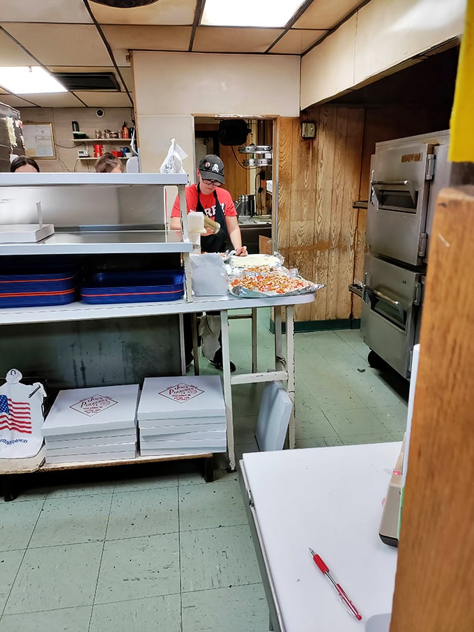No fancy chef's kitchen here&mdash;just hardworking pizza artisans in their natural habitat, crafting the pies that have kept Dayton coming back for decades. 