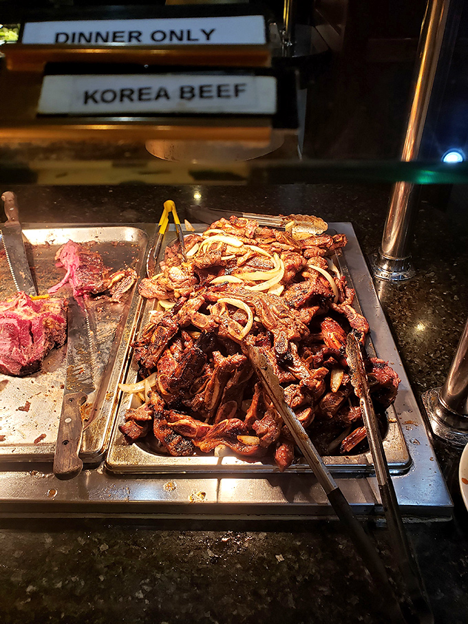 Korean beef, glistening with sweet and savory marinade, waits patiently beside its raw counterpart &ndash; a before-and-after story told in protein.
