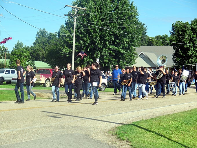 The Labor Day Parade marches forward with hometown pride, where every tuba player and flag bearer is someone's neighbor or cousin.