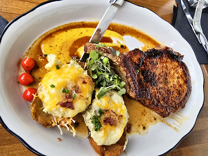 A lamb chop that deserves its own spotlight, accompanied by loaded potatoes that refuse to be mere supporting actors.