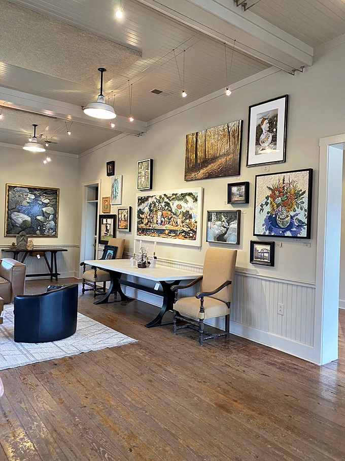 Art finds its perfect home in this gallery, where weathered wood floors creak with appreciation under the weight of beauty and contemplation.