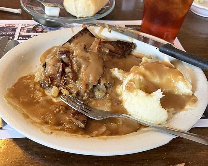 Liver and onions&mdash;the dish that separates food tourists from true comfort food aficionados&mdash;swimming in gravy that demands bread for sopping.