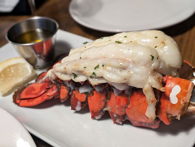 This lobster tail isn't just dinner&mdash;it's maritime royalty, served with drawn butter that should be classified as liquid gold.