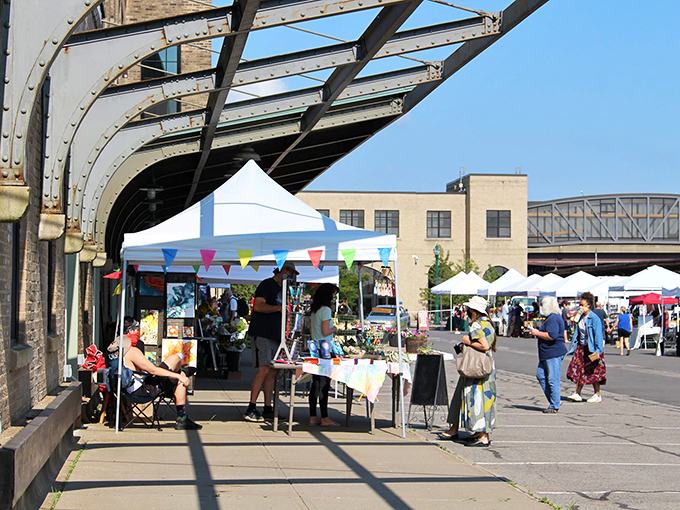 The vibrant green storefront of Utica Coffee Roasting Company stands as a caffeinated beacon of downtown revival, where history gets a fresh pour-over.