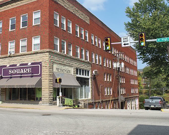 The Messenger building anchors this corner with the gravitas of a town elder. When buildings could talk, this one would have the best stories.