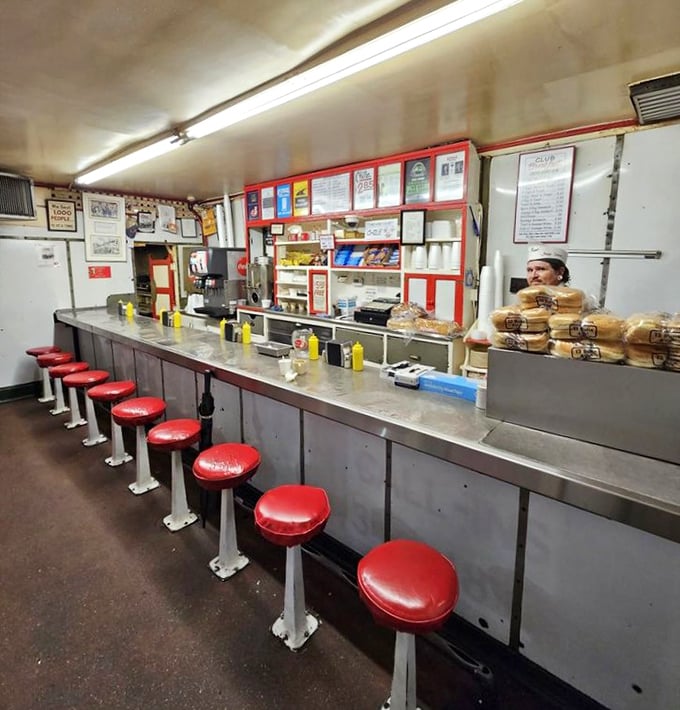 The counter stretches like a runway for food dreams, where burgers and hot dogs have been taking flight into happy stomachs for generations.