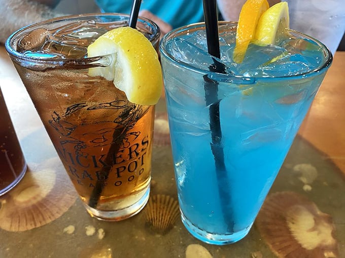 Dueling cocktails in coastal colors&mdash;one amber, one azure&mdash;promising a perfect pairing with whatever emerges from the kitchen's steamy depths.