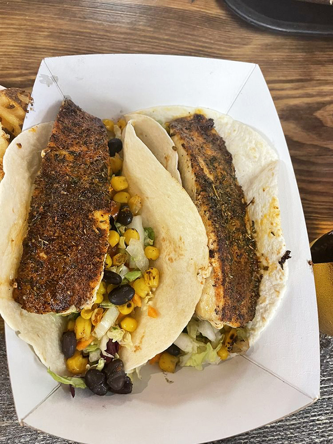 Blackened fish tacos where the spice-crusted mahi meets sweet corn and black beans&mdash;proof that Ohio understands good seafood.