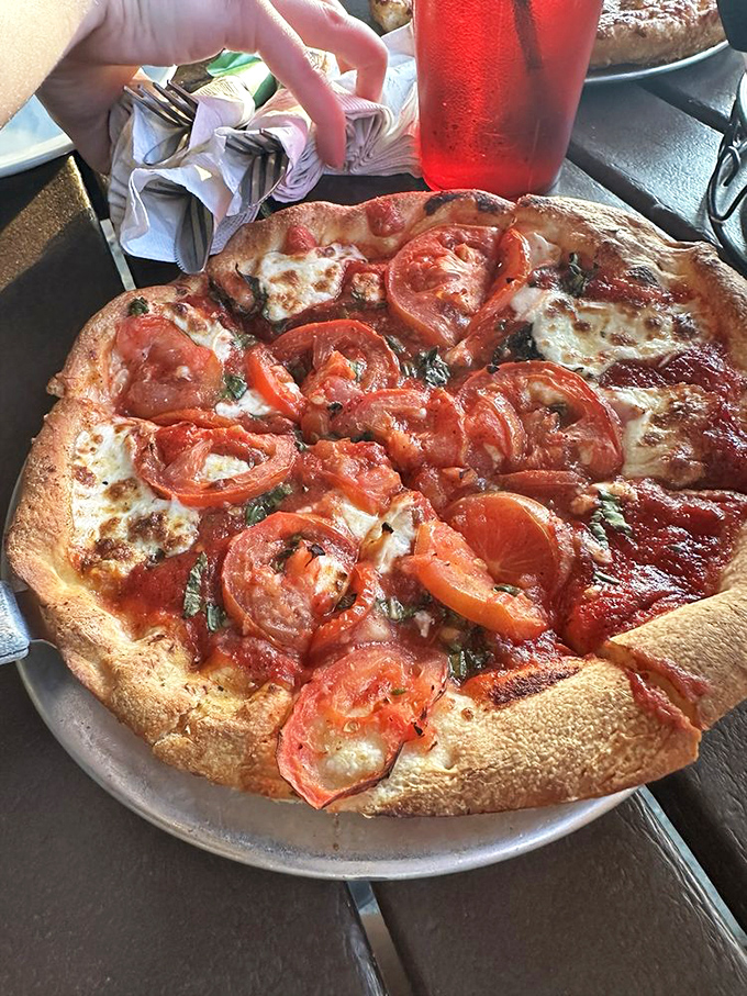 The Margherita pizza&mdash;proof that simplicity, when executed perfectly, can outshine complexity every time. Less is more, unless it's cheese.