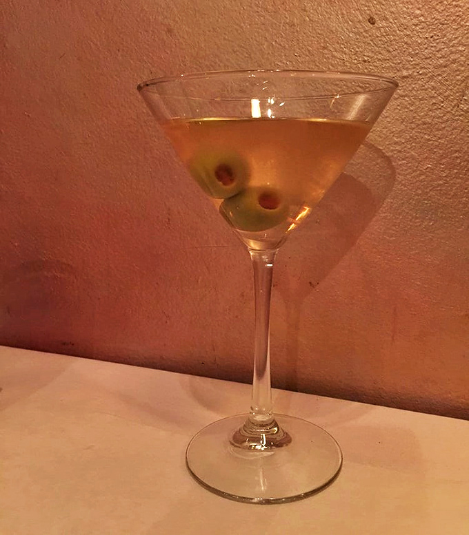 A martini so classic and pristine it could have been mixed by James Bond himself, complete with olives standing at attention.