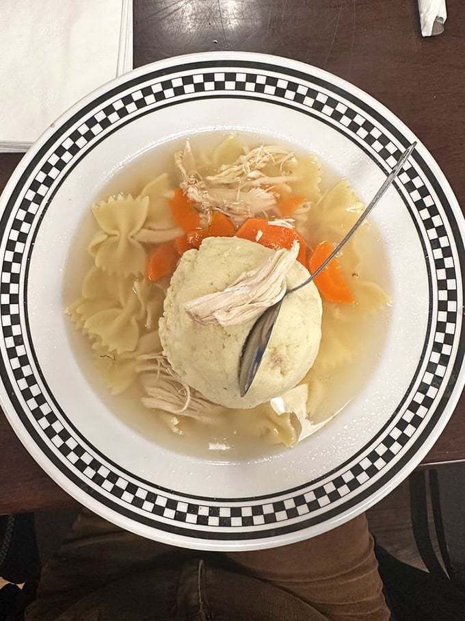 This isn't just soup&mdash;it's a floating matzo ball island in a sea of golden chicken broth that could cure everything from colds to existential crises.