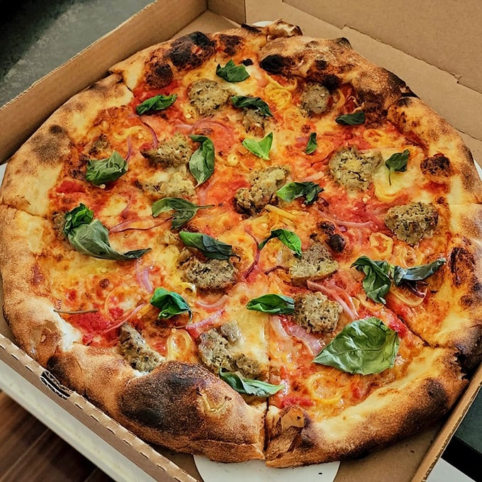 Meatballs and basil playing nicely together. This pizza doesn't just satisfy hunger&mdash;it creates memories and inspires return visits.