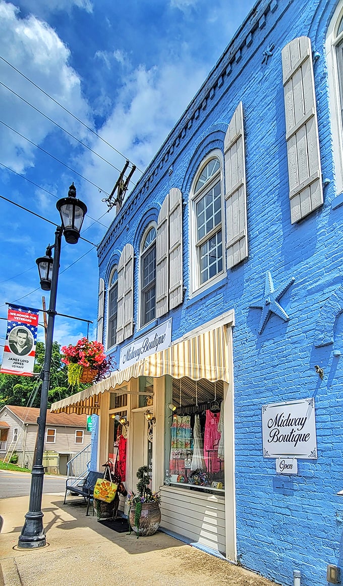 The Midway Boutique's vibrant blue fa&ccedil;ade and crisp white shutters pop against Kentucky's blue skies&mdash;a splash of color in this historic downtown.