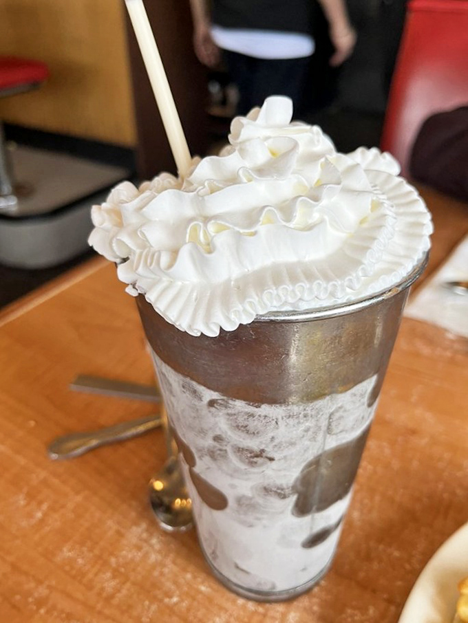 A milkshake towering with whipped cream&mdash;dessert masquerading as a beverage, and nobody's complaining.