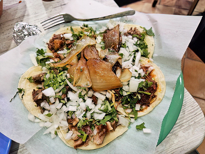 These mini tacos aren't playing around. Topped with the traditional cilantro and onion duo, they're the perfect three-bite vacation for your taste buds.