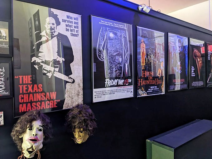 Classic horror movie posters line the walls, a nostalgic reminder of all those films that made you sleep with the lights on for weeks.