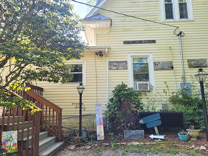 This sunny yellow building houses creative spirits, where handmade signs and climbing vines suggest you've found Floyd's artistic heart.