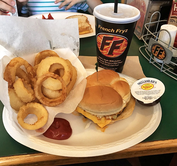 The classic combo that launched a thousand food comas &ndash; a cheeseburger and onion rings that would make your cardiologist wince and your taste buds sing.