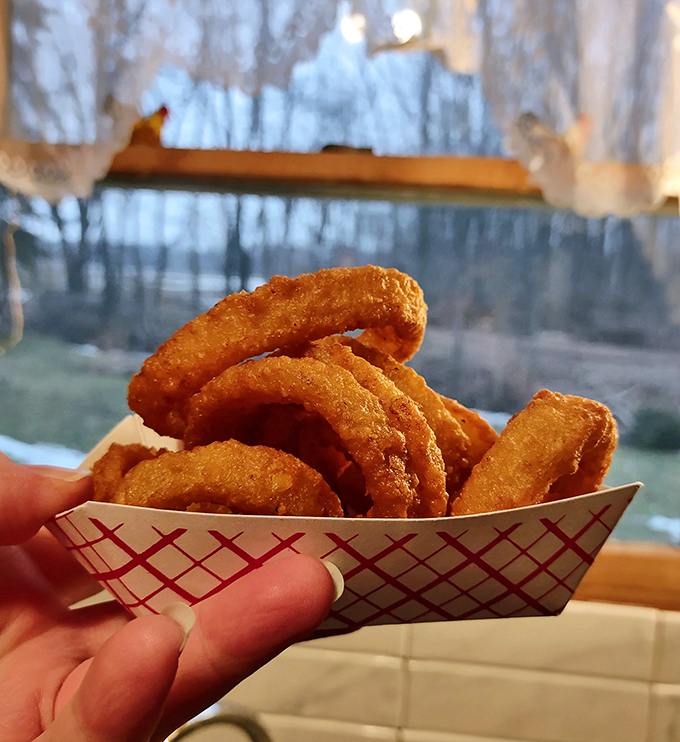 These aren't just onion rings; they're golden halos of happiness. Crispy, substantial, and served in a paper boat&mdash;seafaring vessels for flavor voyages.