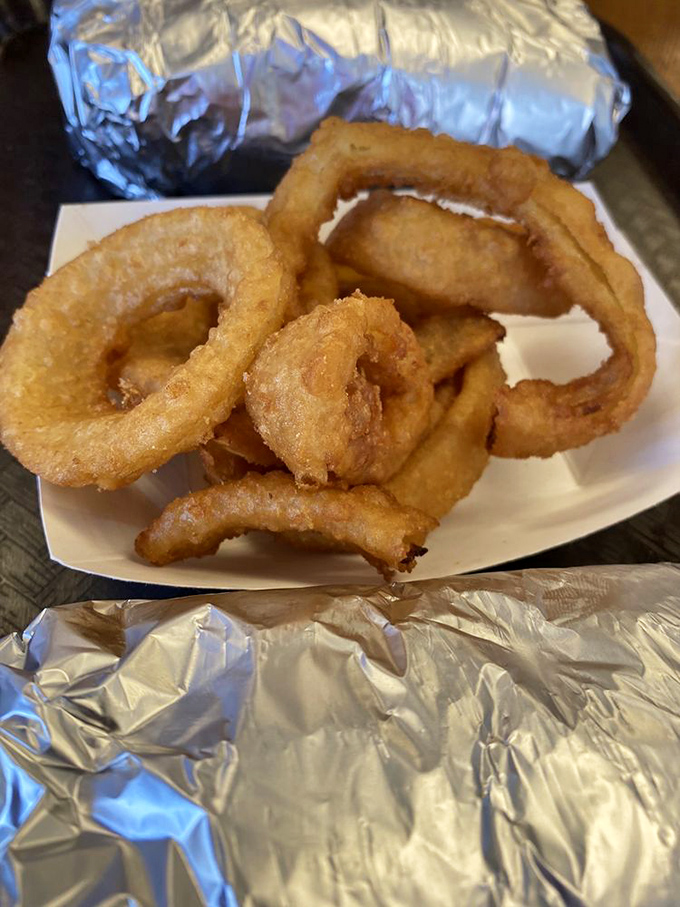 Onion rings with the structural integrity of Olympic gymnastics equipment and twice the satisfaction when you bite into them.