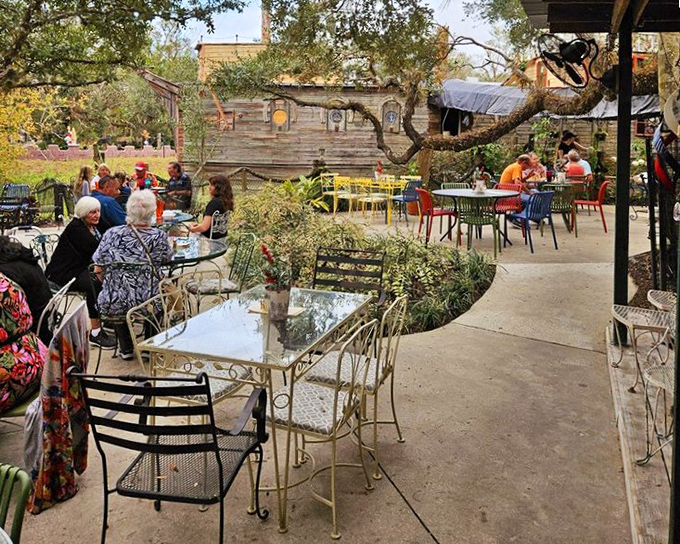 Colorful chairs dot the outdoor dining area, where guests can enjoy Florida breezes while contemplating how many aluminum cans it would take to build their own castle.