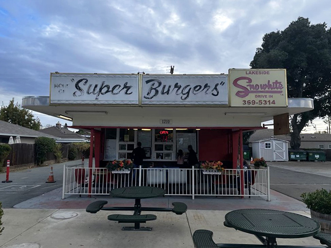 The classic roadside view that signals good things ahead. That Super Burgers sign has been guiding hungry travelers for generations. 