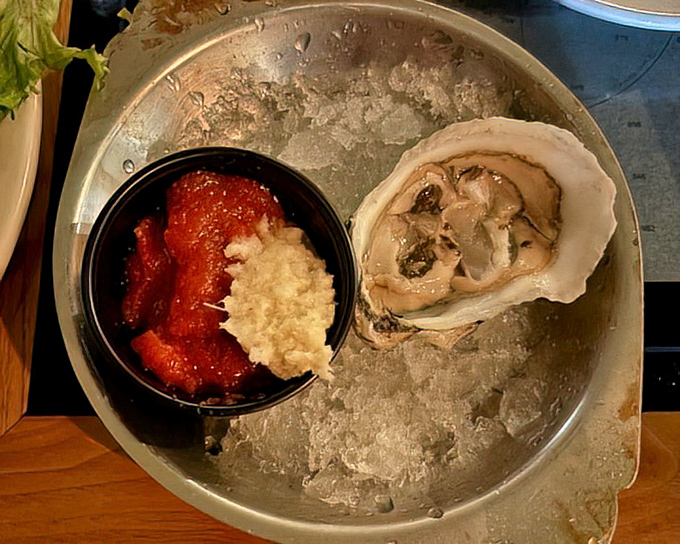 An oyster on the half shell with classic accompaniments. Nature's perfect appetizer&mdash;briny, mineral-rich, and requiring absolutely no improvement from the kitchen.