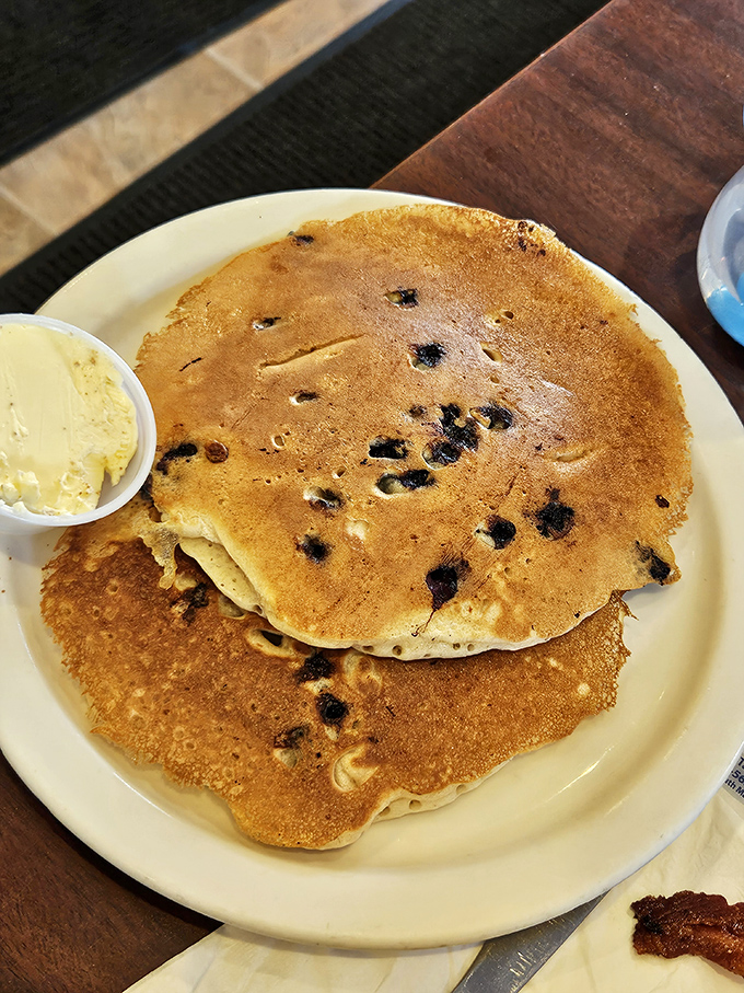 These blueberry pancakes aren't just breakfast, they're an edible security blanket &ndash; fluffy, golden, and ready for their butter-melting close-up.