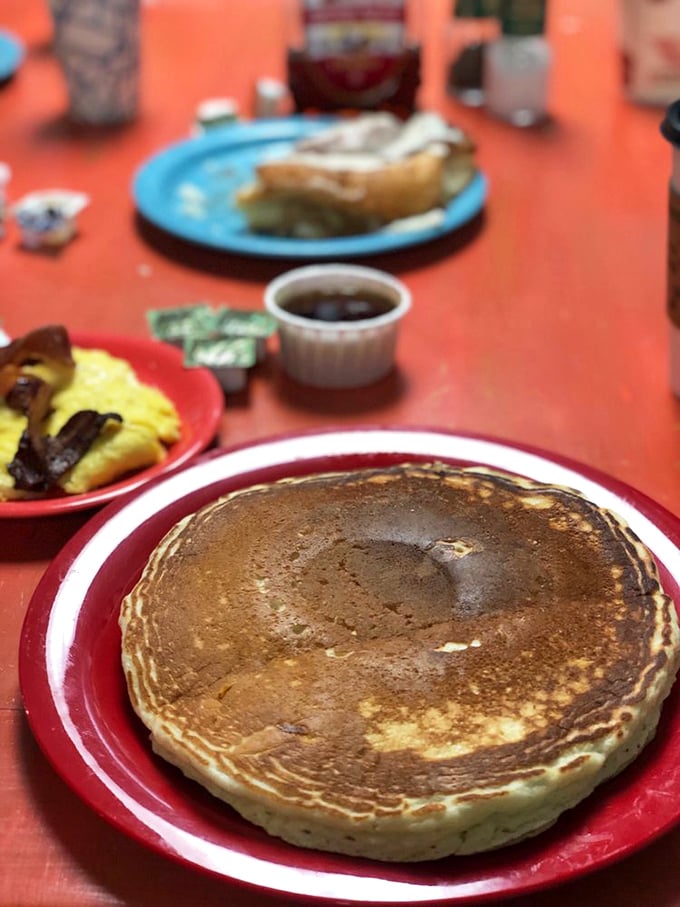 This pancake isn't just breakfast, it's an edible frisbee of joy that somehow manages to be both fluffy and substantial.